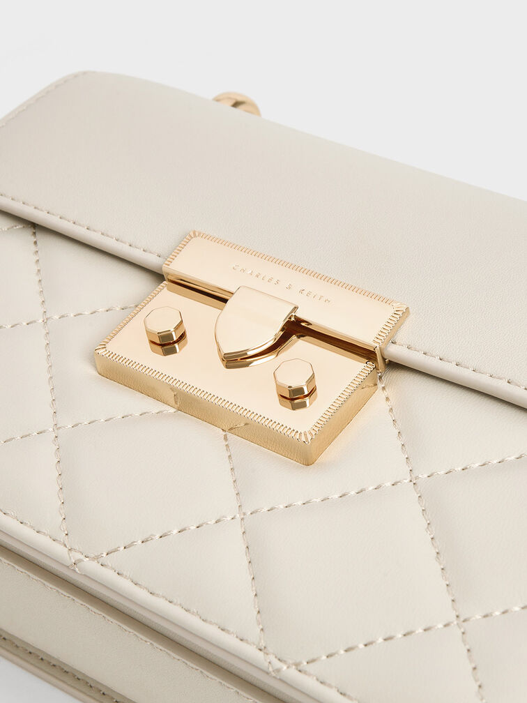 Túi đeo chéo Quilted Push-Lock Chain ngà - CHARLES & KEITH VN